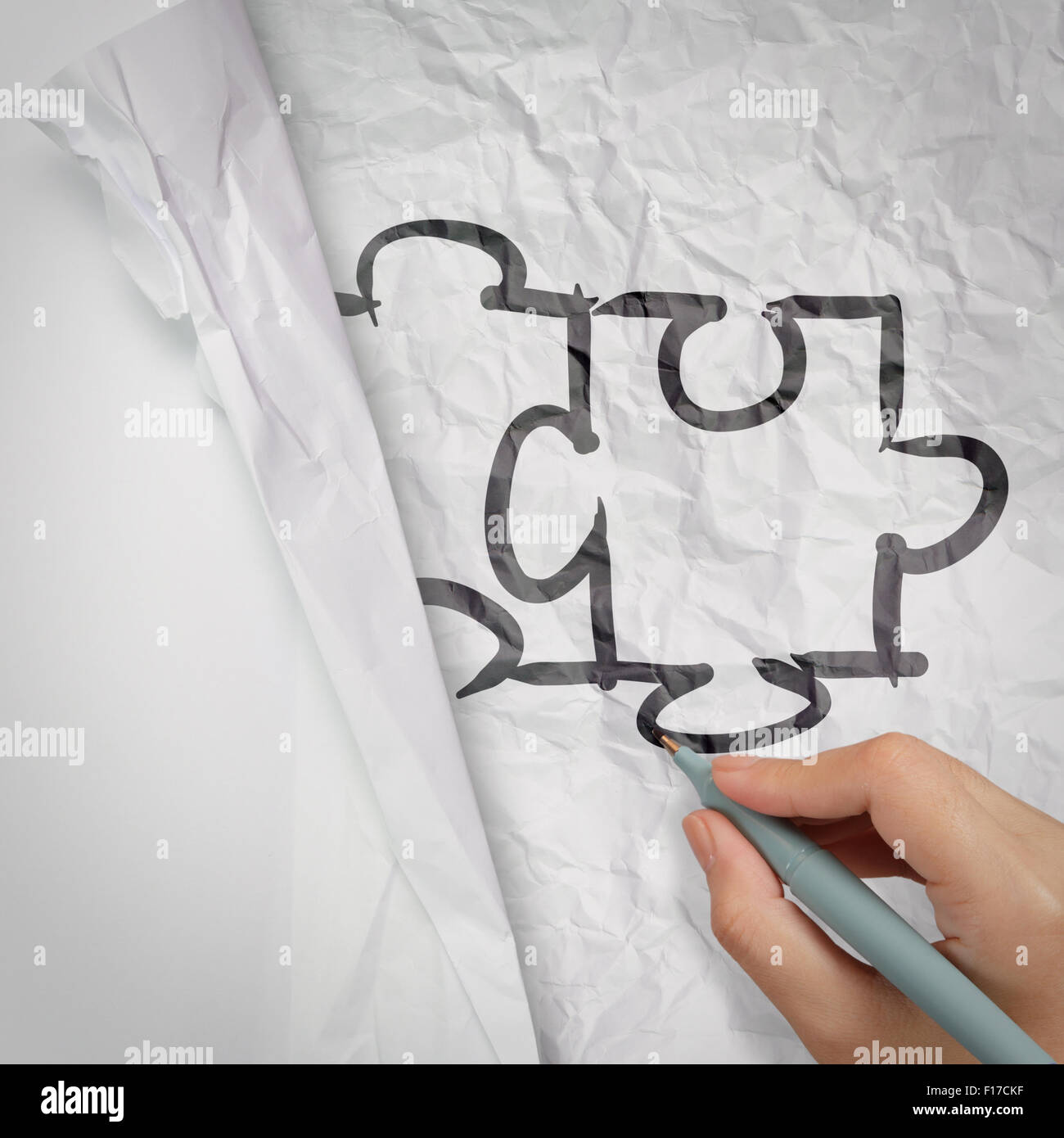 Hand drawing partnership puzzle on hi-res stock photography and images ...