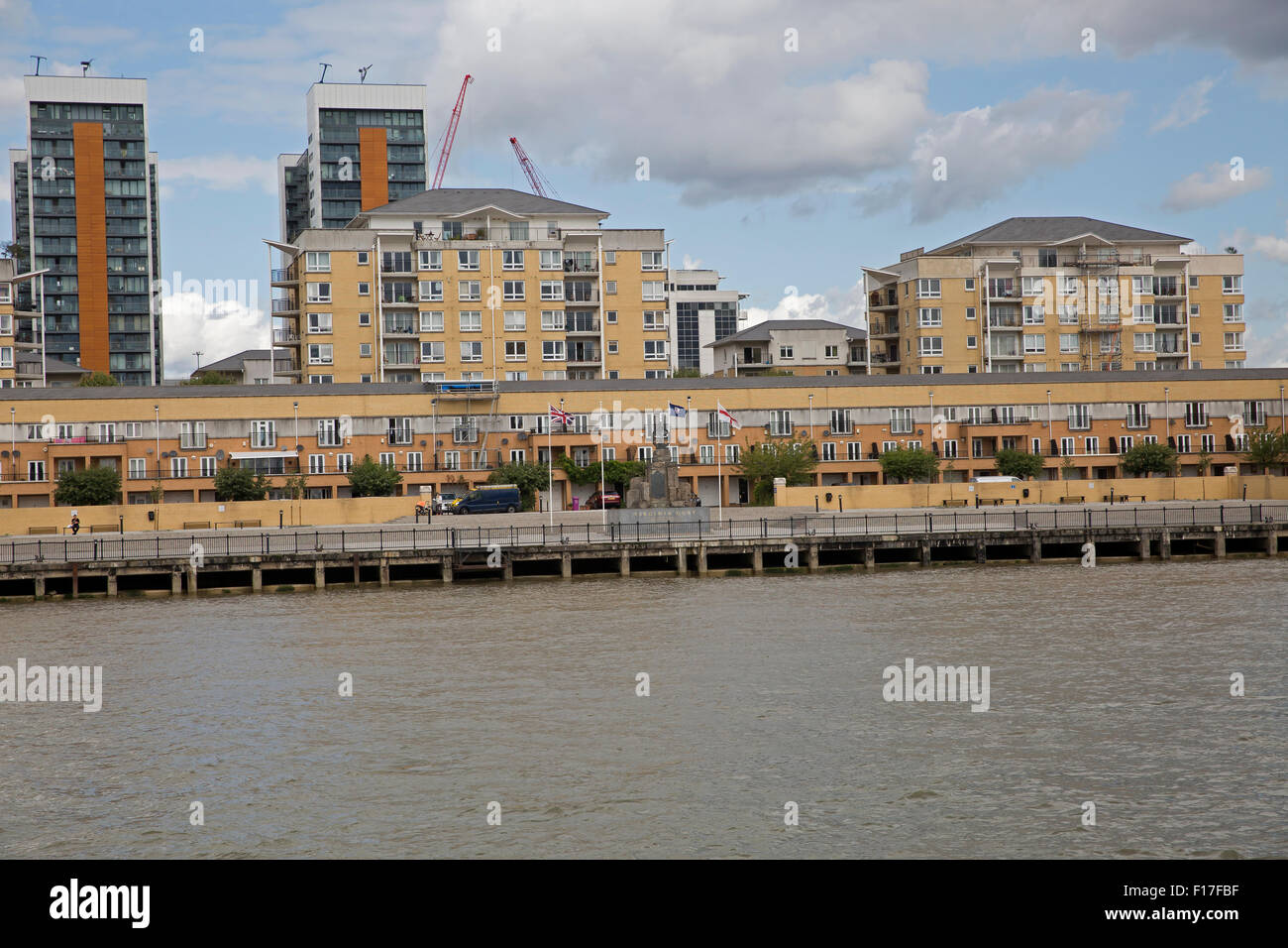 Riverside apartments and office buildings as seen from the River Thames ...