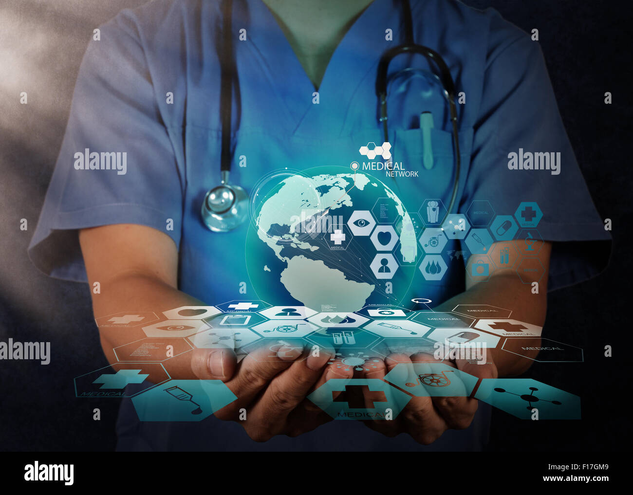 Medical Doctor holding a world globe in her hands as medical network ...