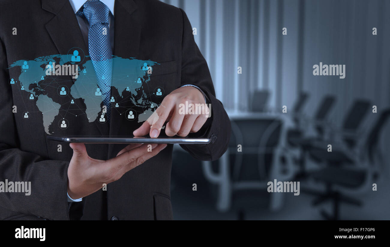 businessman hand using tablet computer and board room background Stock ...