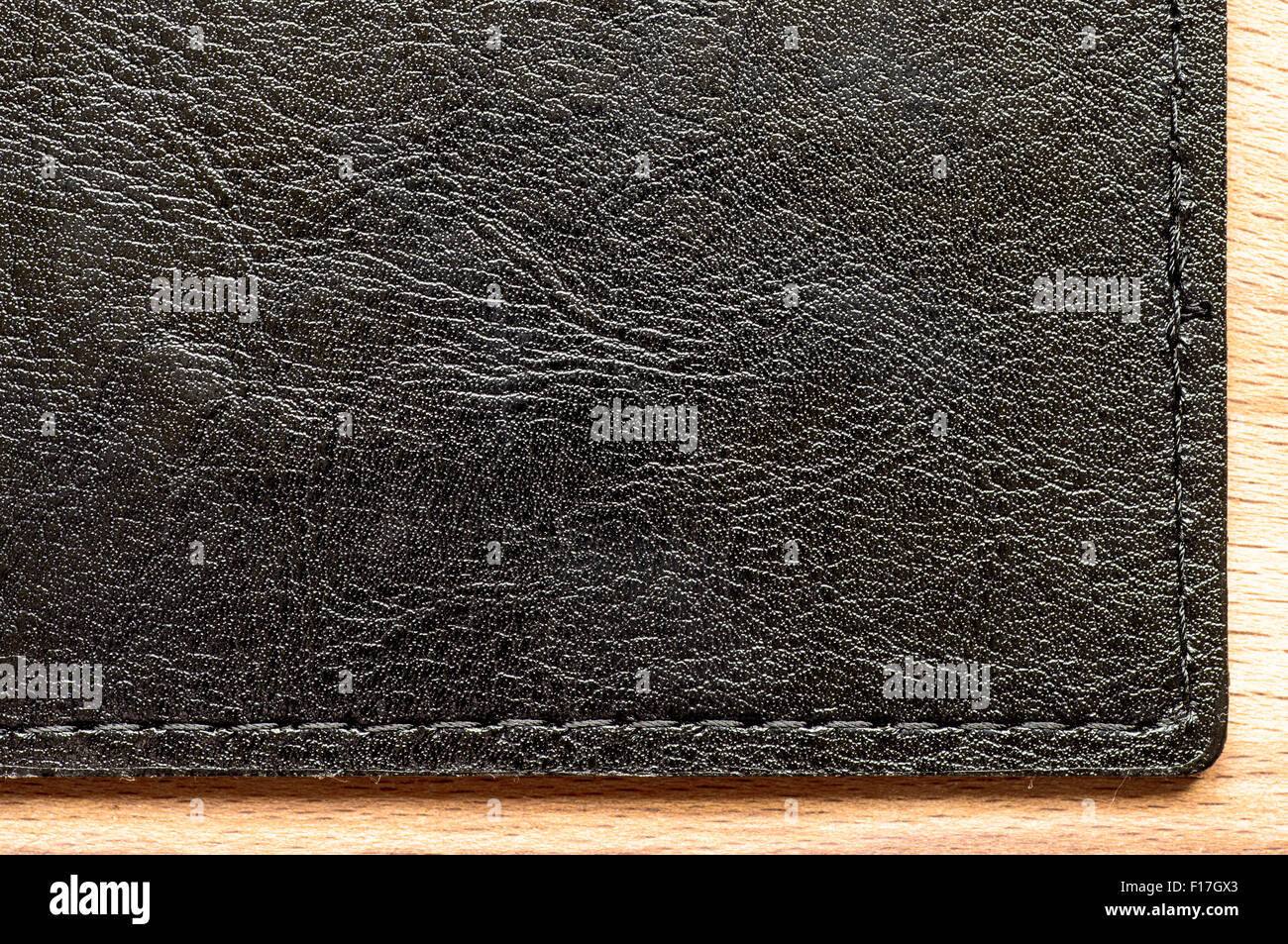 Sew thread background black leather texture Stock Photo - Alamy