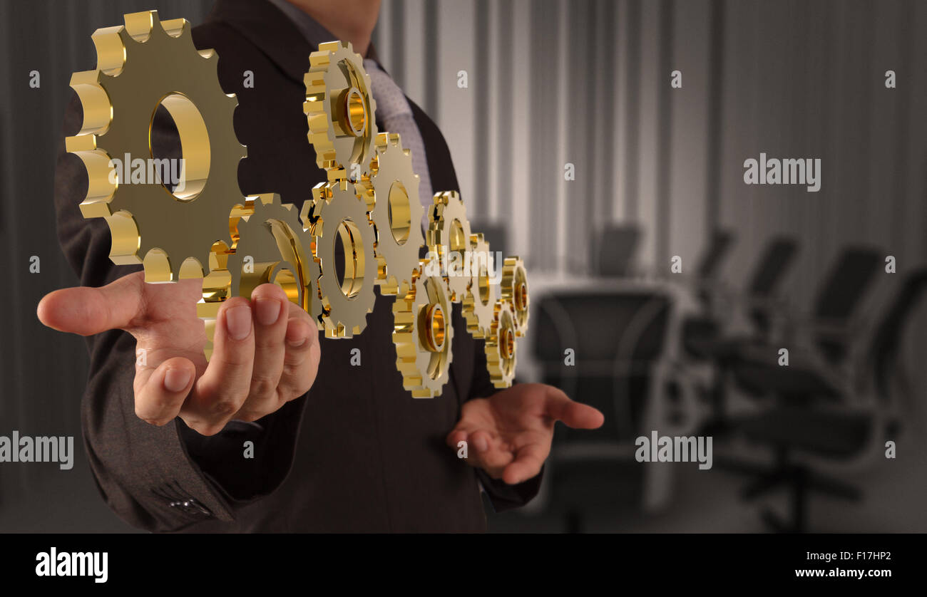 businessman hand draws gear to success concept Stock Photo - Alamy