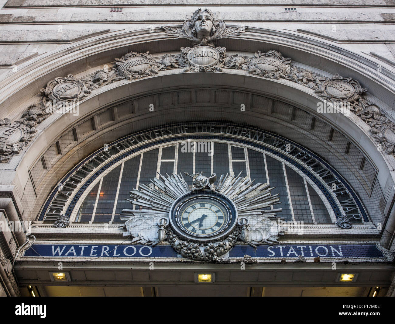 The clock above the steps of waterloo station Stock Photo - Alamy