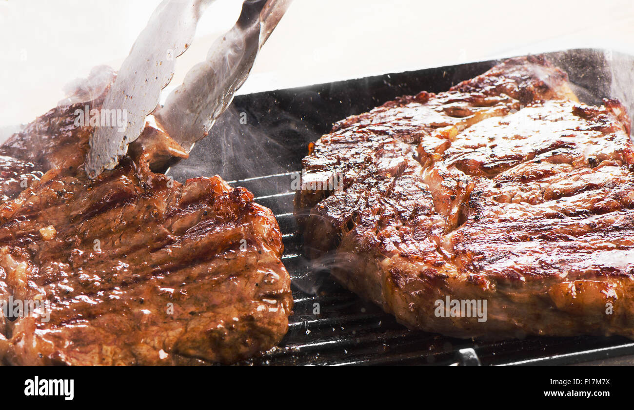 Raw grilled beef steak hi-res stock photography and images - Alamy