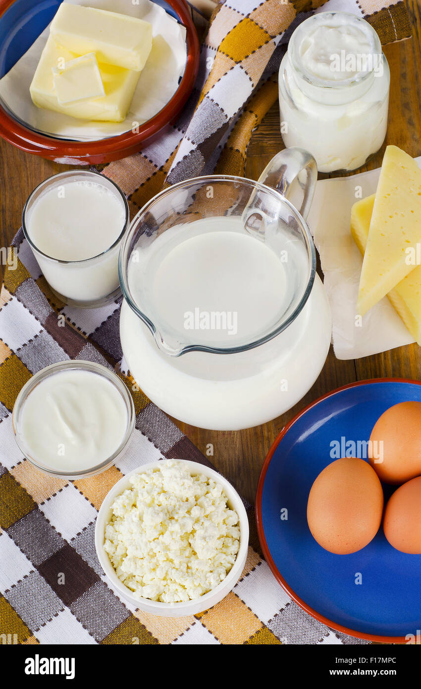 Dairy products on a wooden table. Top view Stock Photo - Alamy