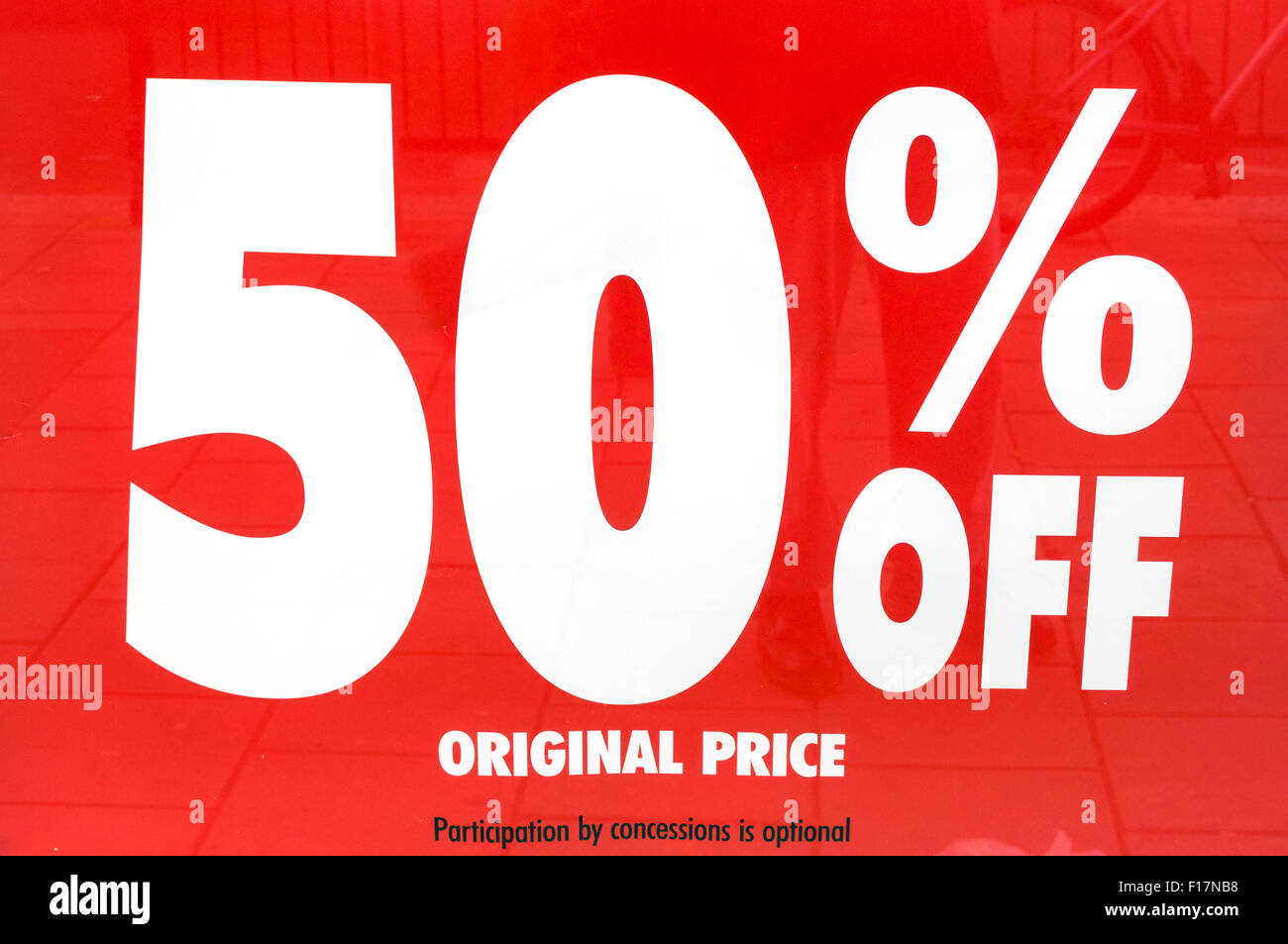 Price slash sign in shop window Stock Photo - Alamy