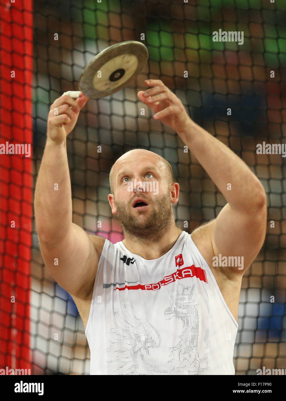 Beijing, China. 29th Aug, 2015. Piotr Malachowski of Poland competes in ...