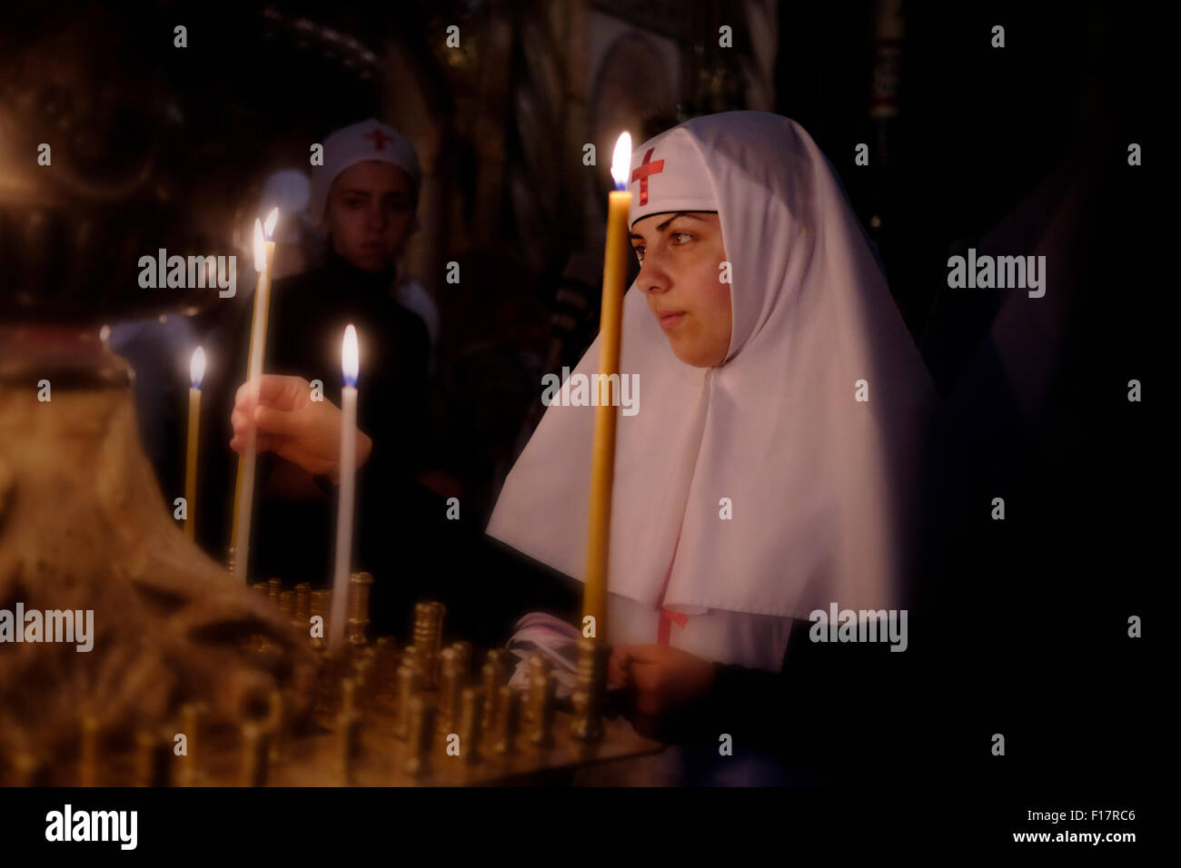 Candles nun hi-res stock photography and images - Alamy