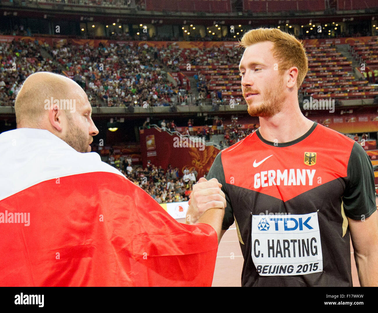 Beijing, China. 29th Aug, 2015. Germany's Christoph Harting shakes ...