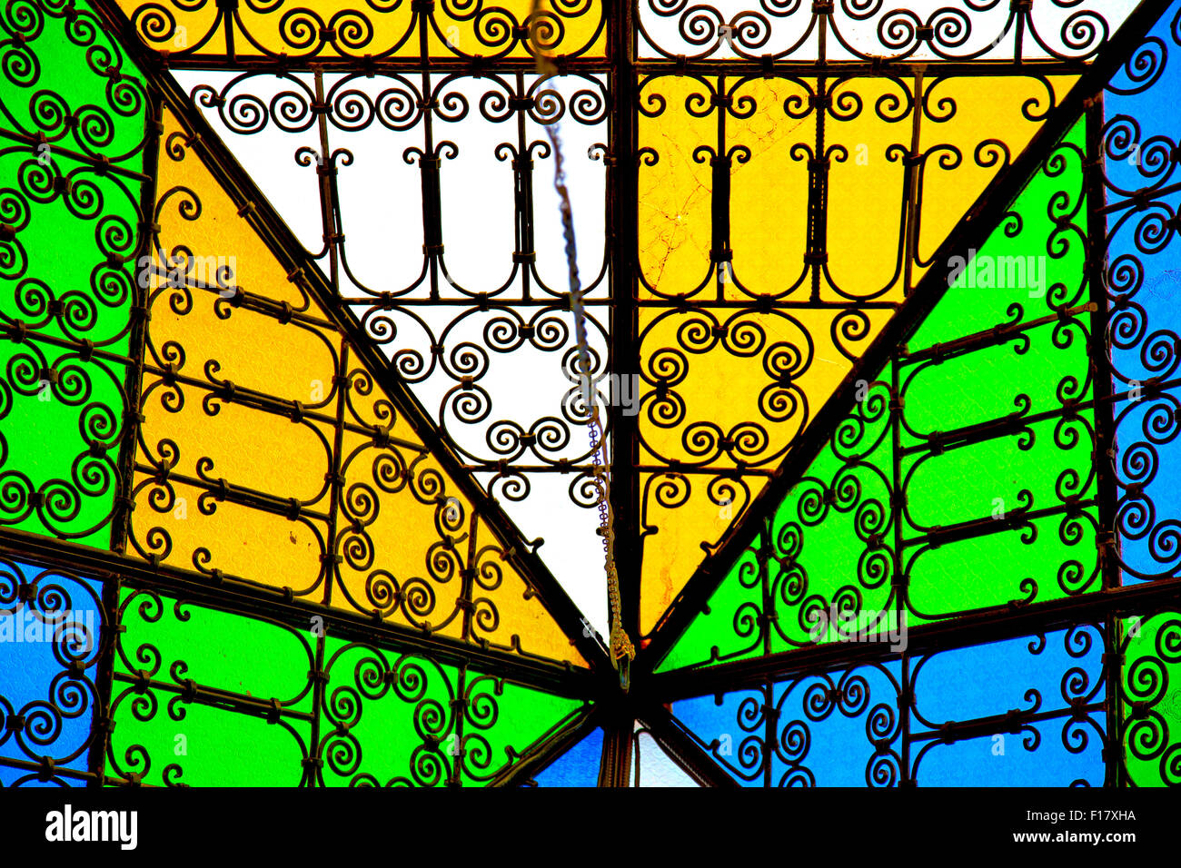 colorated glass and sun in morocco africa window and light Stock Photo ...