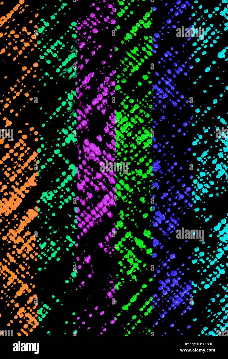 multicolor printing ink on paper in dark Stock Photo - Alamy