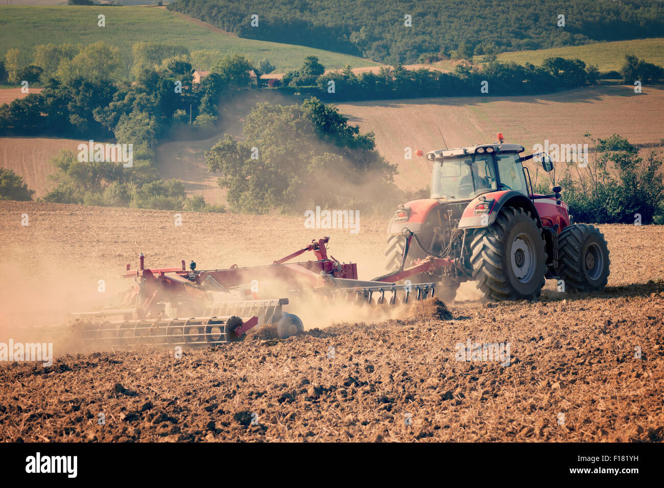 Farmer in tractor ploughing field hi-res stock photography and images ...