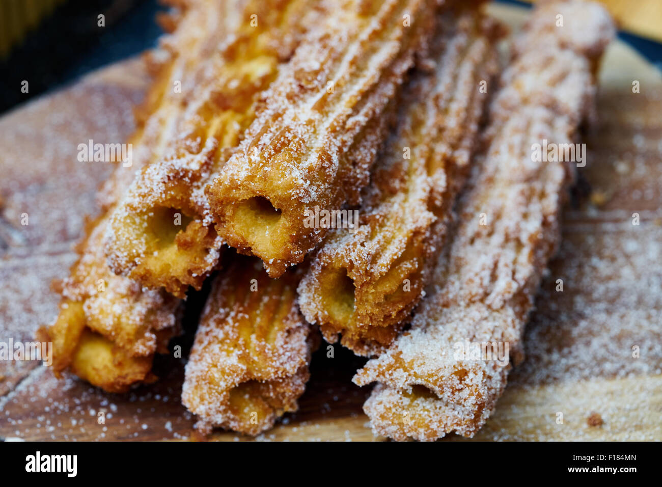 A pile of Churros sticks at a market Stock Photo - Alamy