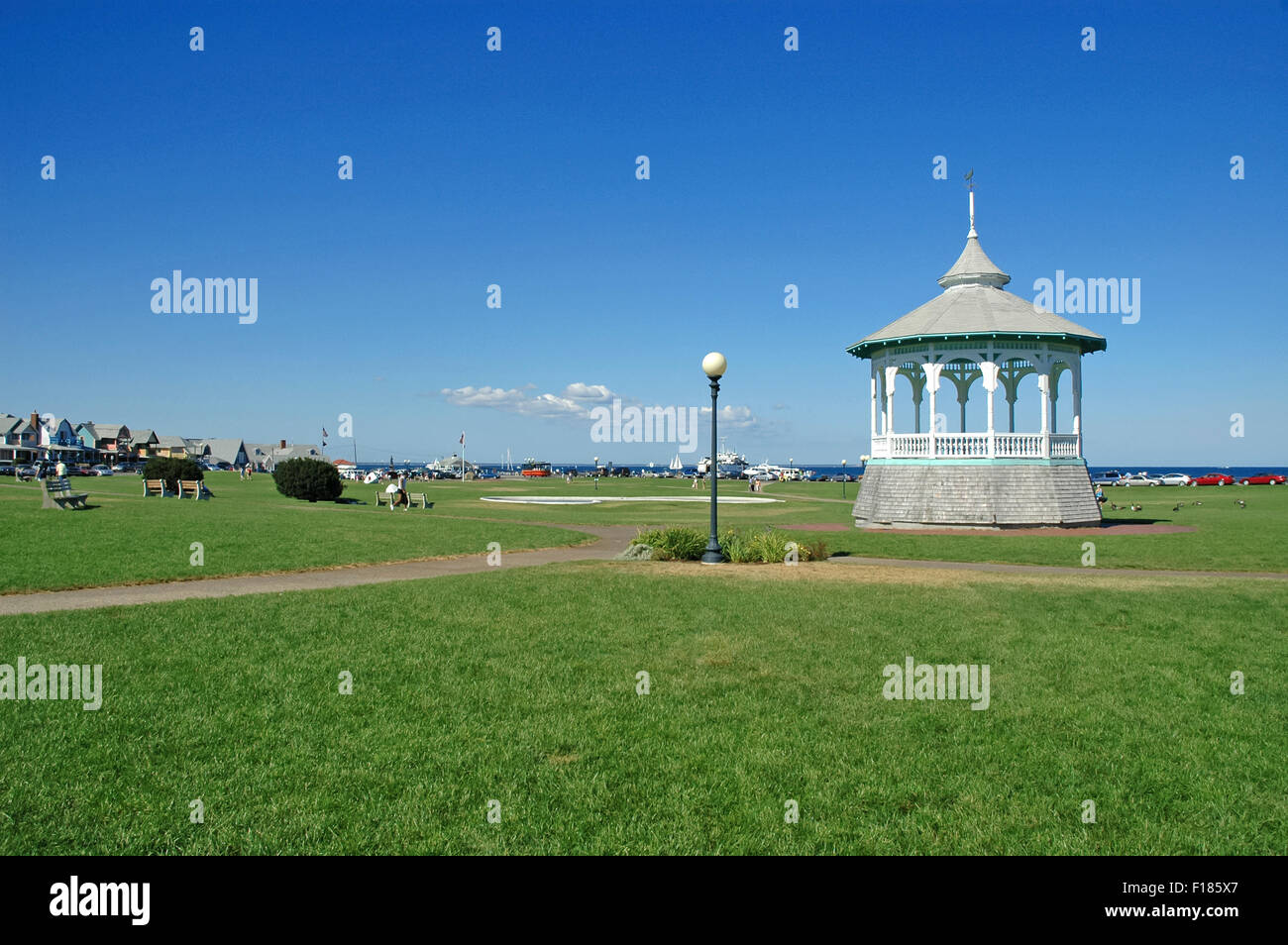 White Gazebo with green grass and blue sky, Cape Cod, Massachusetts ...