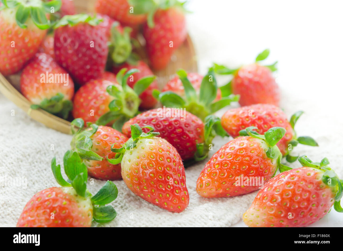 close up fresh red strawberries over sackcloth , ripe fruit Stock Photo ...