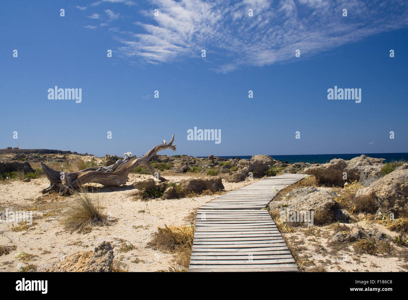 Wooden path way on a beautiful beach in Greece Stock Photo - Alamy