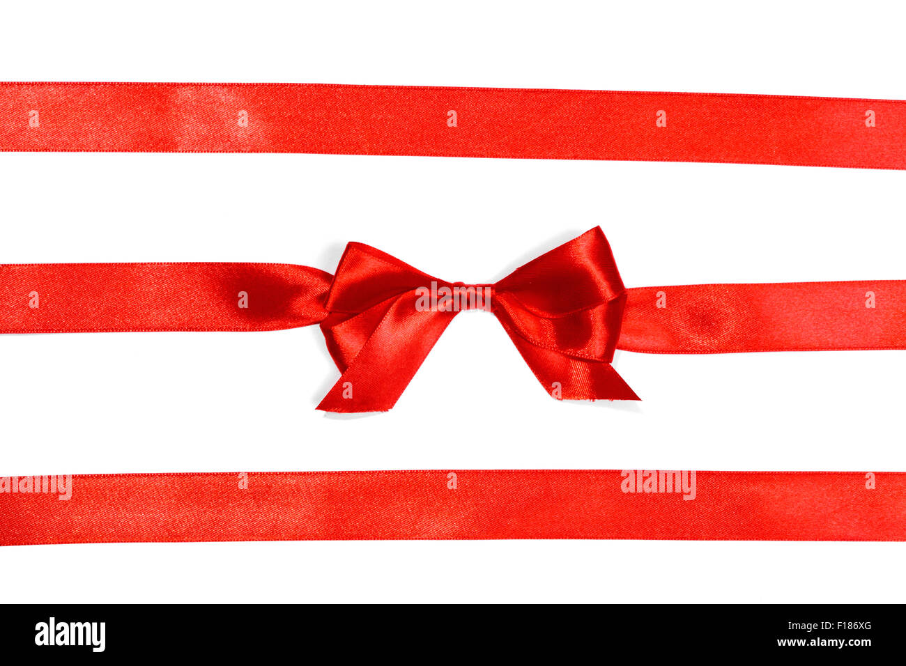 Red ribbons with bow Stock Photo - Alamy