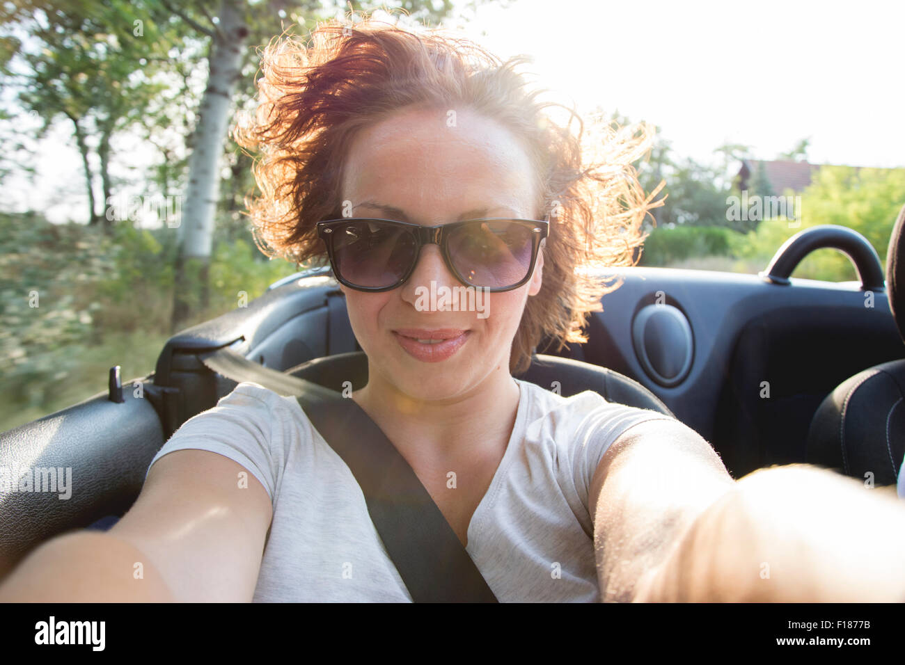 Driving convertible wind hair hi-res stock photography and images - Alamy