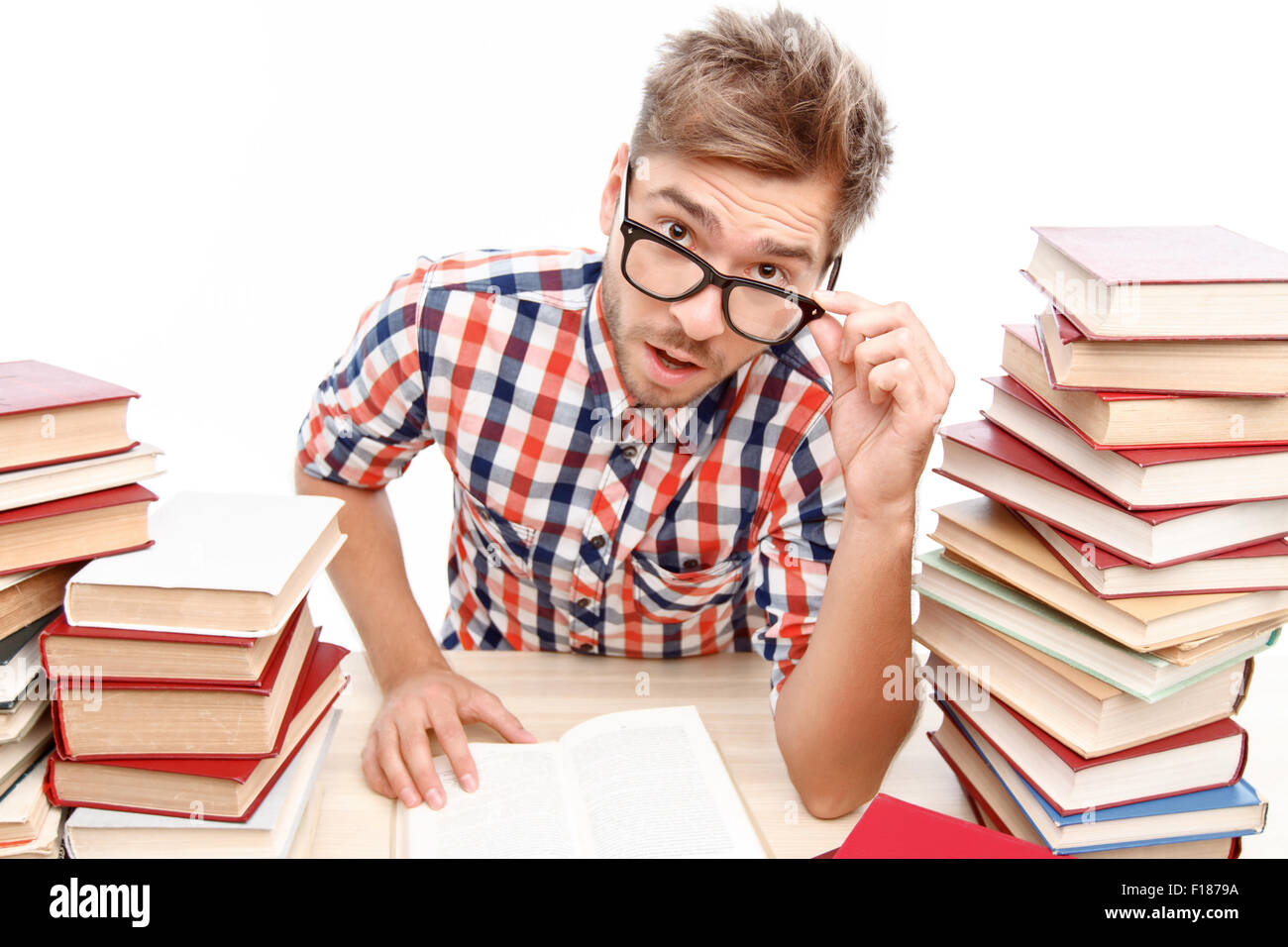 Positive student studying in the library Stock Photo - Alamy