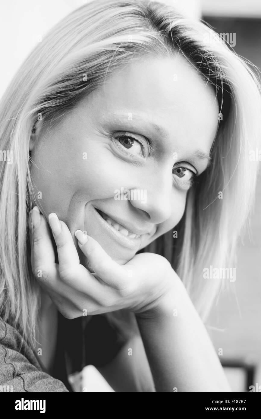 Young smiling woman blue Black and White Stock Photos & Images - Alamy