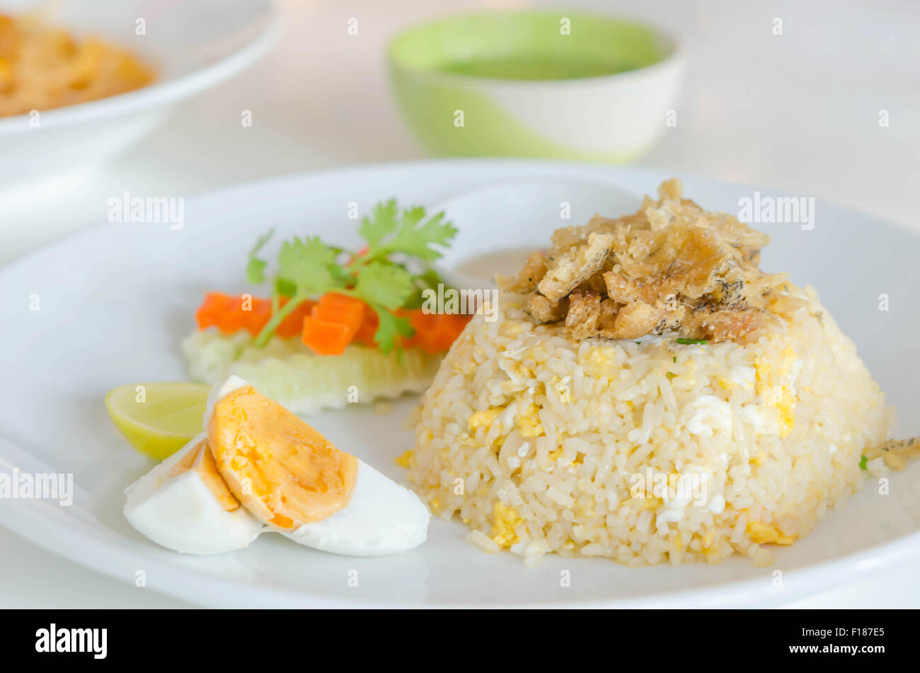 Chinese cuisine, fried rice with fish , salted egg and fresh vegetable ...