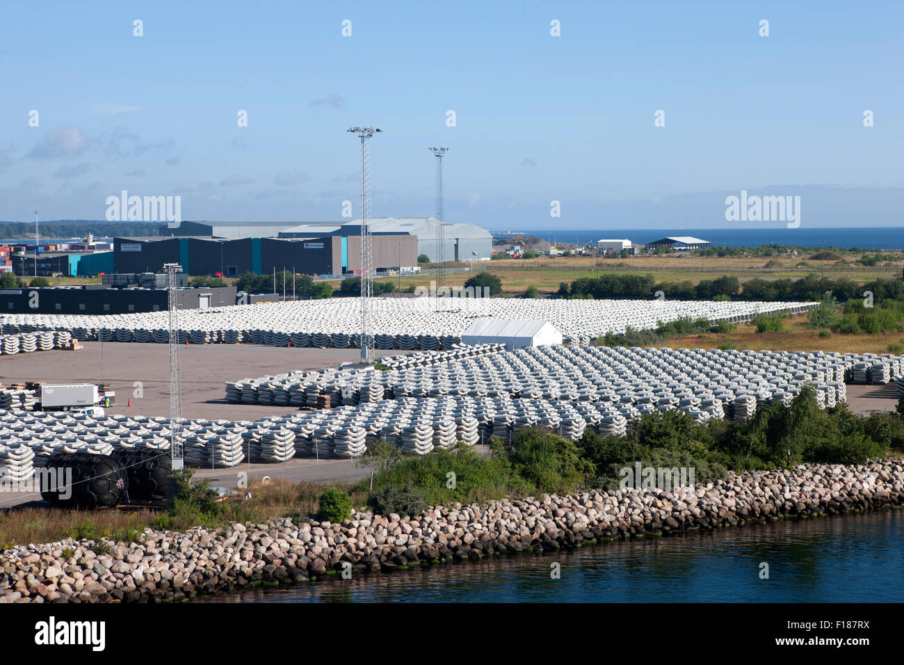The Port of Copenhagen, Denmark in Summer with stacks of pre cast steel ...