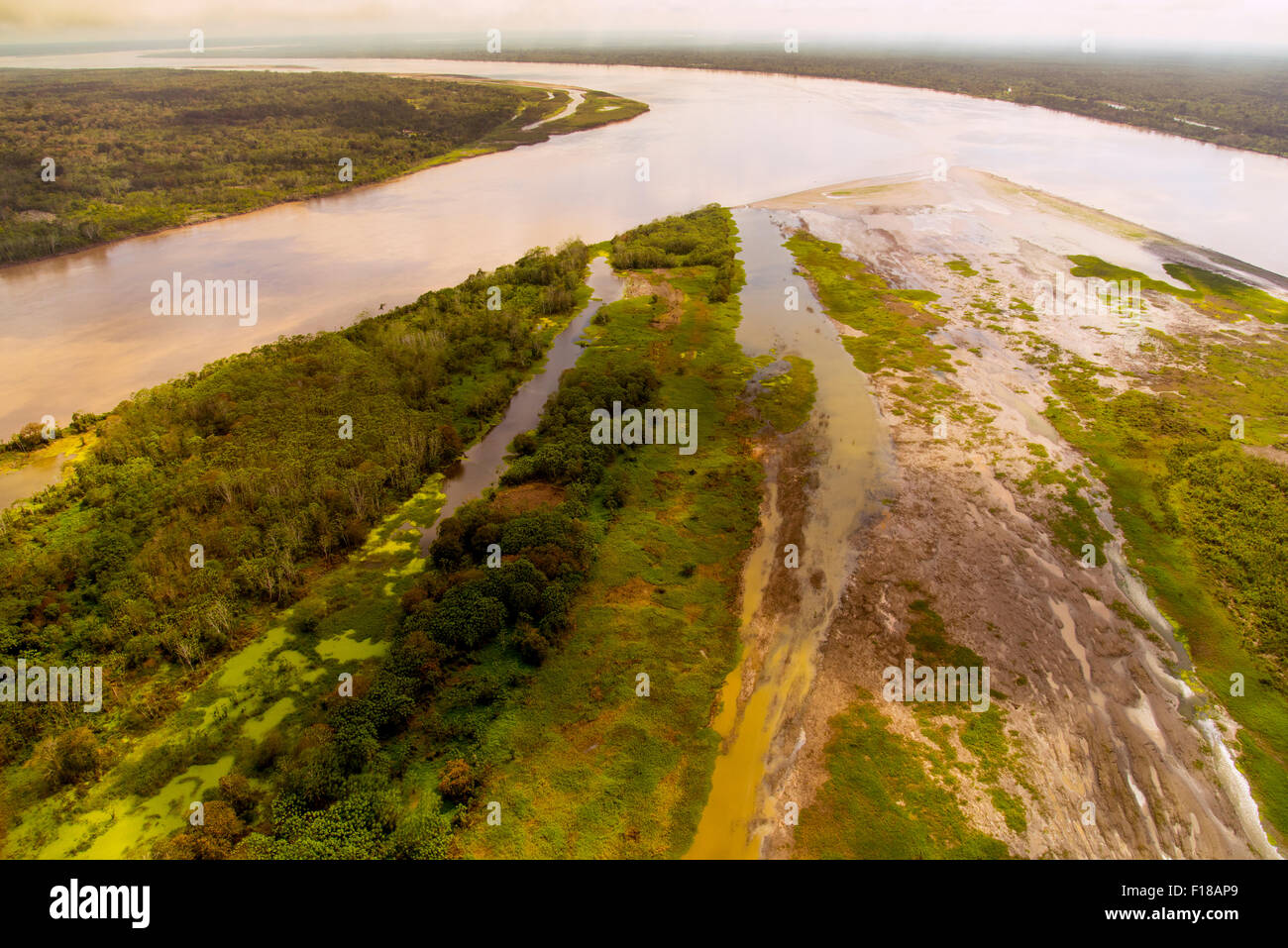 Amazon River aerial, with settlements and secondary rainforest, near ...