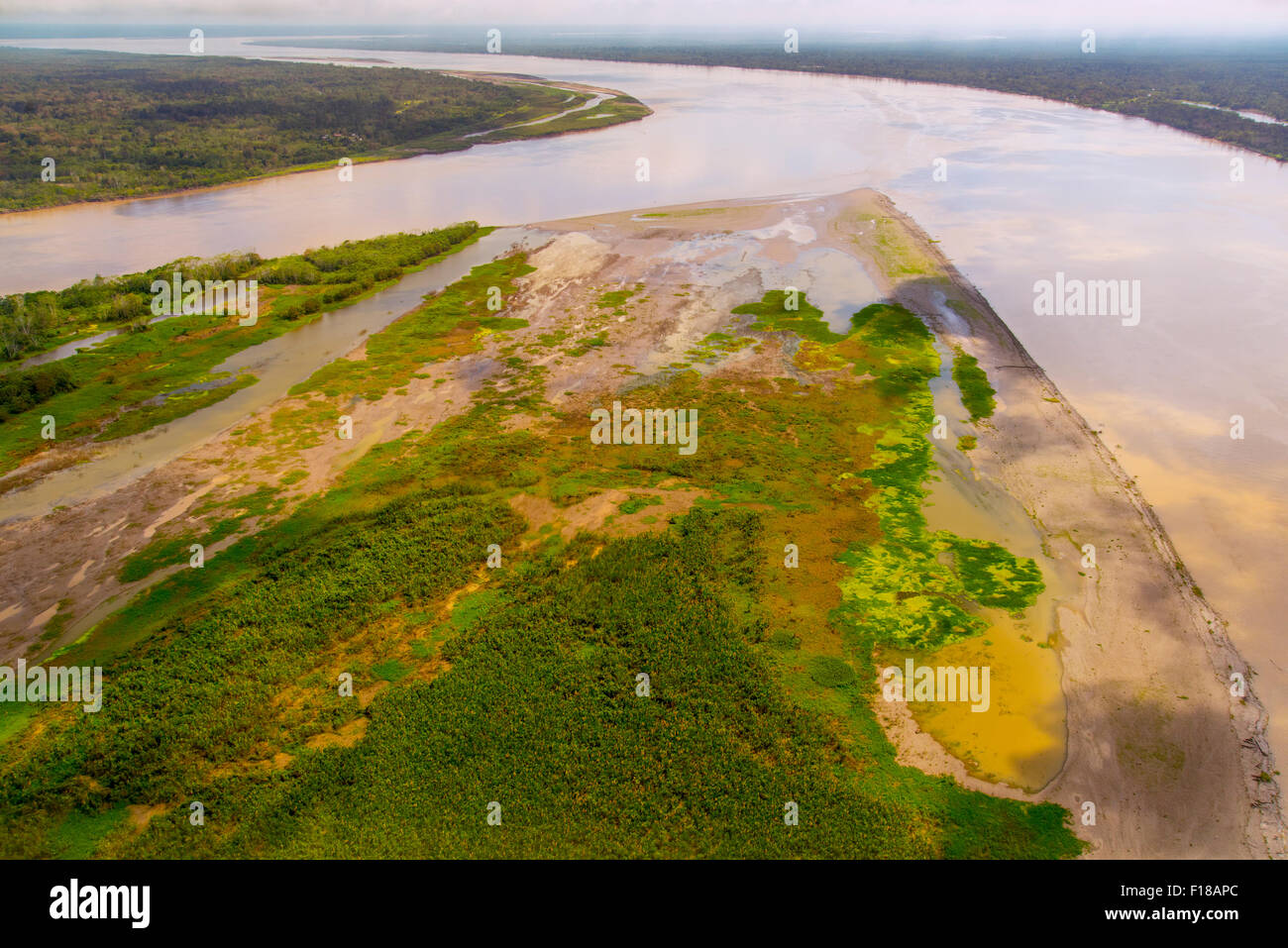 Amazon River aerial, with settlements and secondary rainforest, near ...