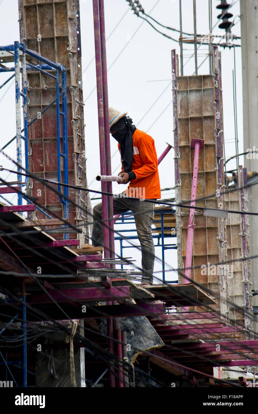 labor working in construction site Stock Photo - Alamy