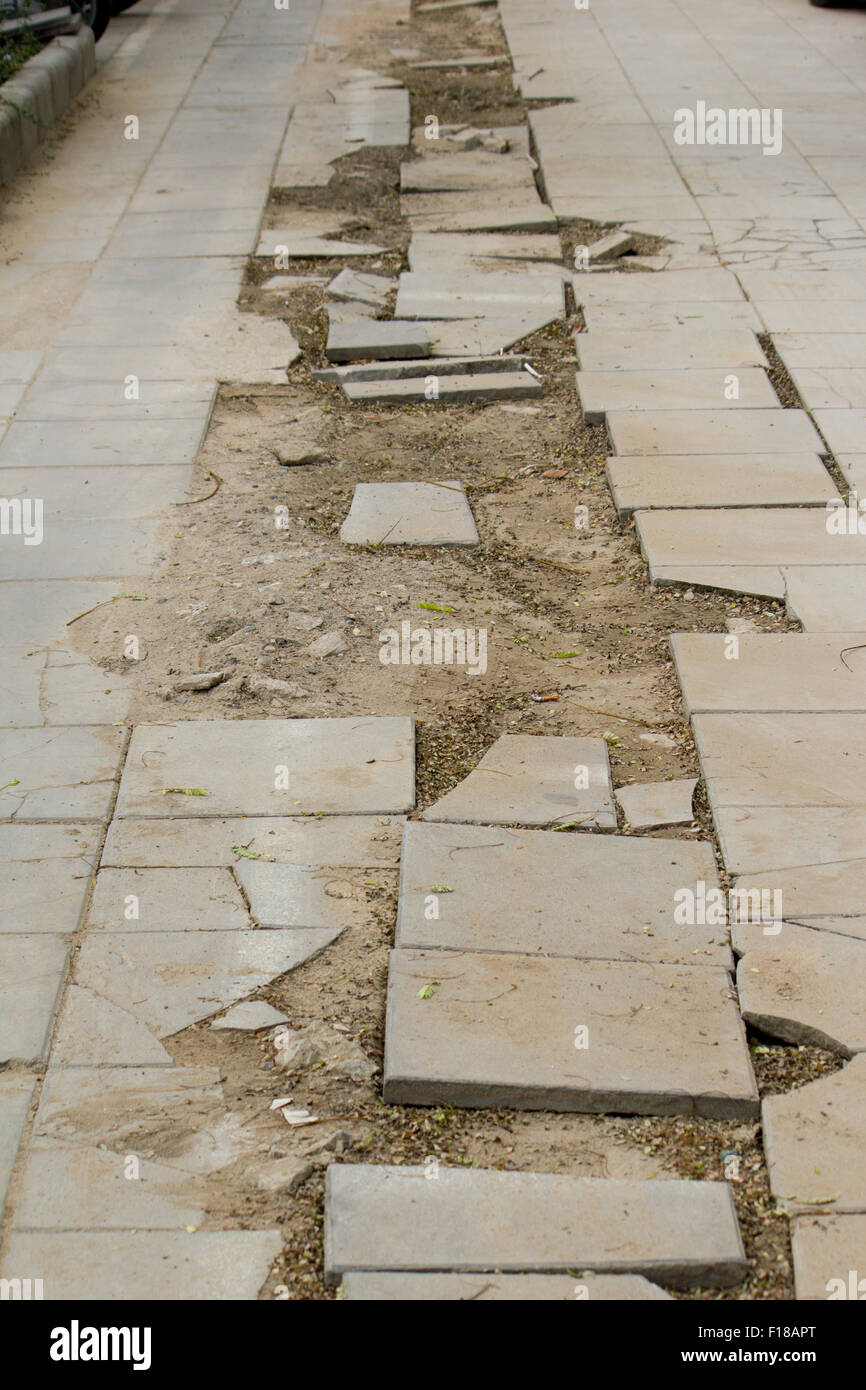 The footpath. cracked Stock Photo - Alamy
