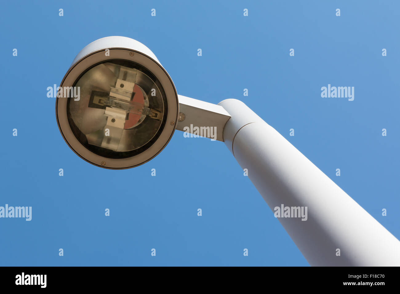 modern street lamp with blue sky in background, public lighting bottom ...