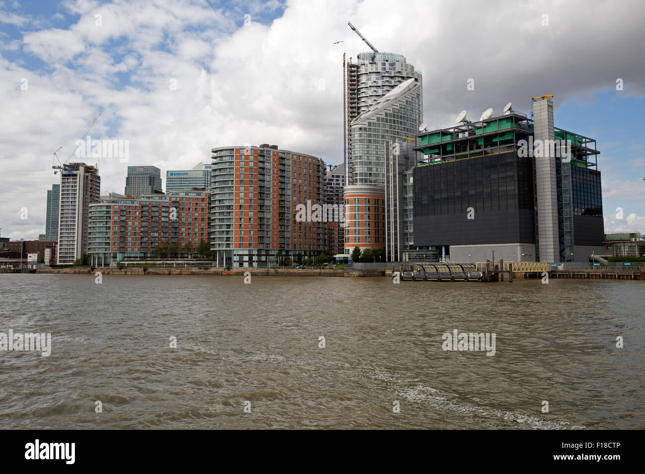 Riverside apartments and office buildings as seen from the River Thames ...