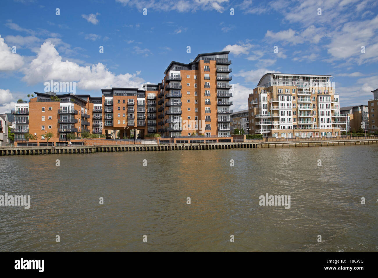 Riverside apartments and office buildings as seen from the River Thames ...
