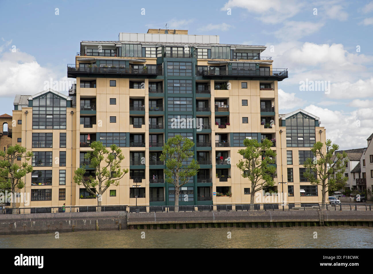 Riverside apartments and office buildings as seen from the River Thames ...