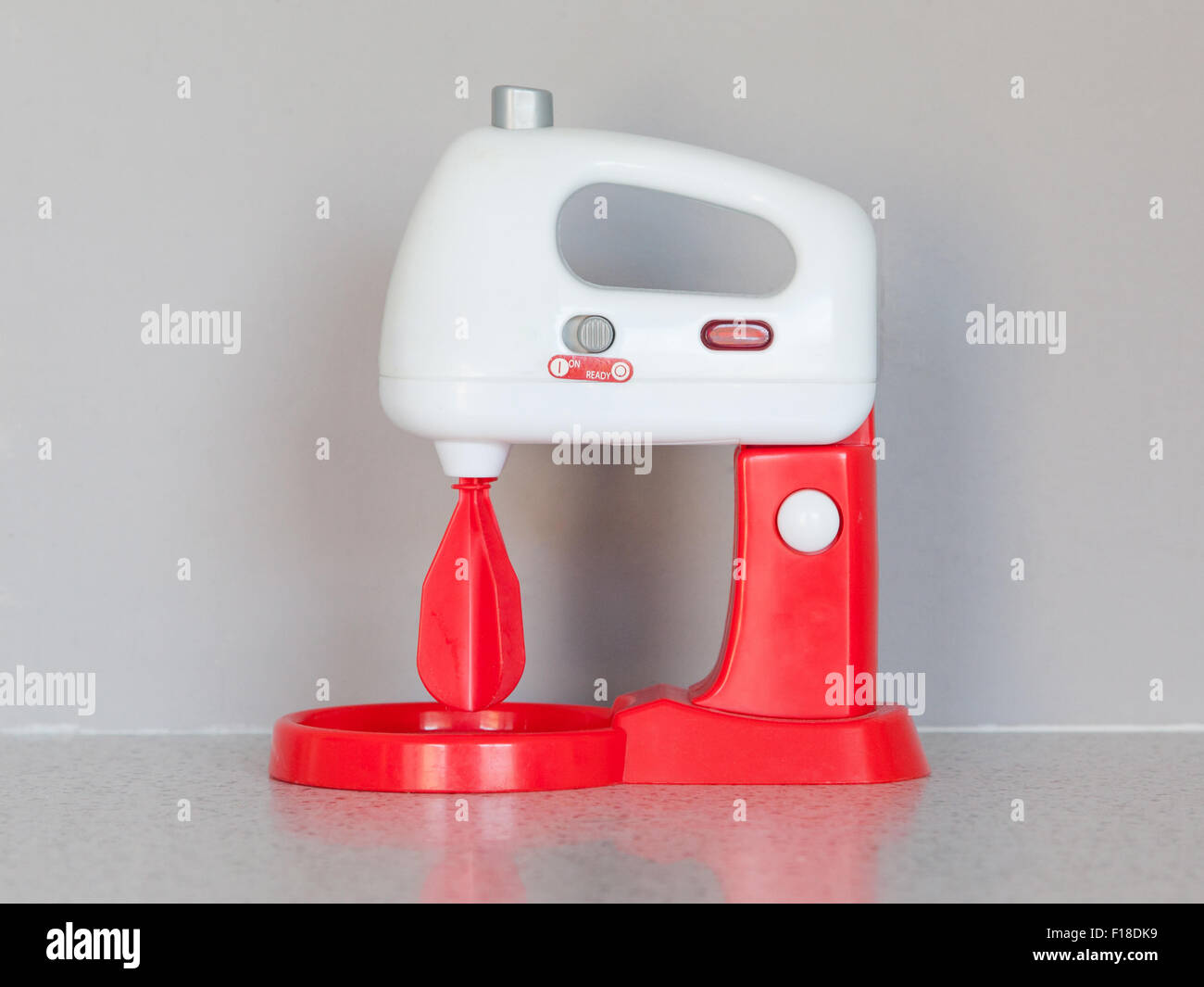 Toy cooking mixer or blender, isolated in the kitchen Stock Photo - Alamy