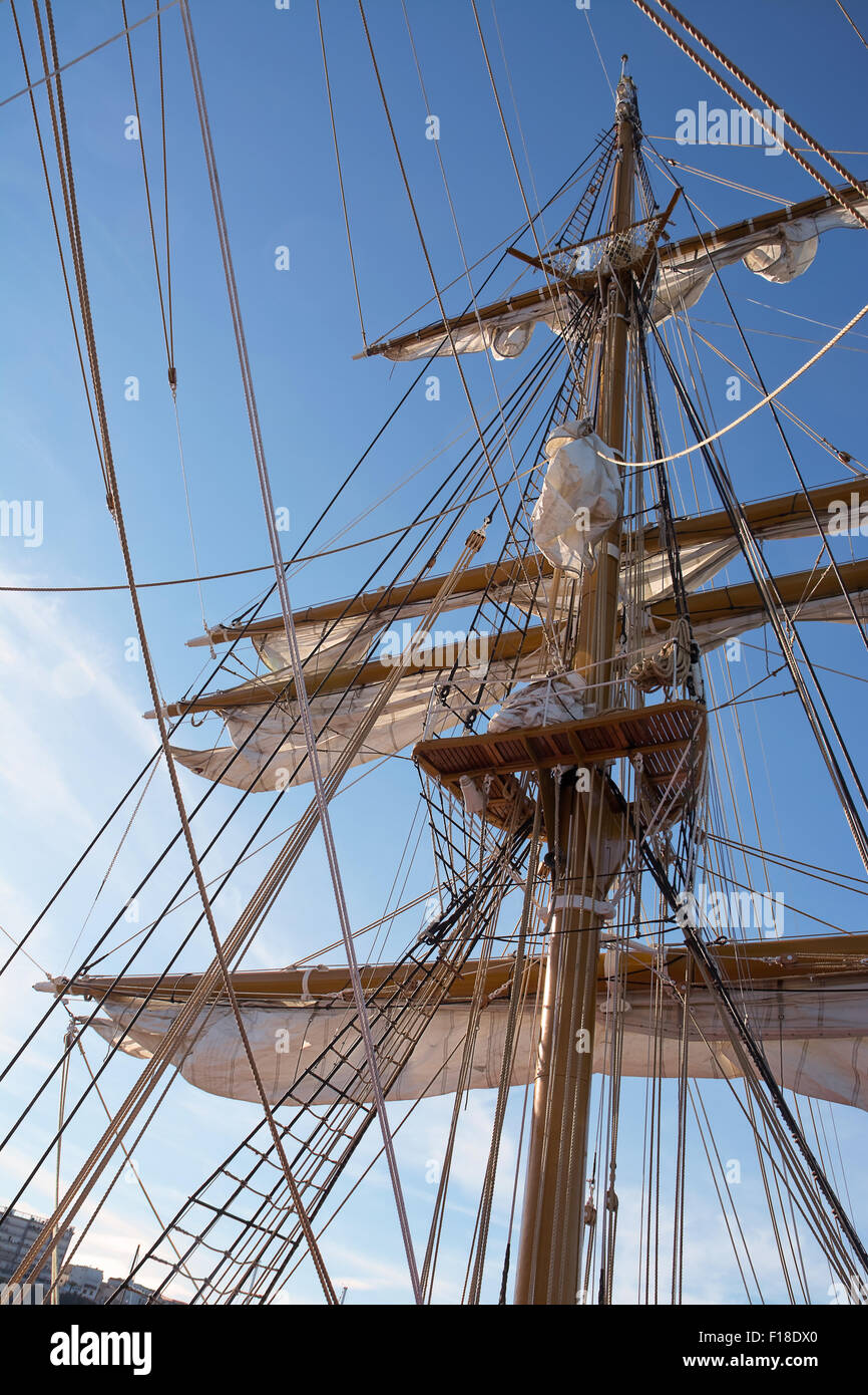 Mast of sail ship in blue sky Stock Photo - Alamy