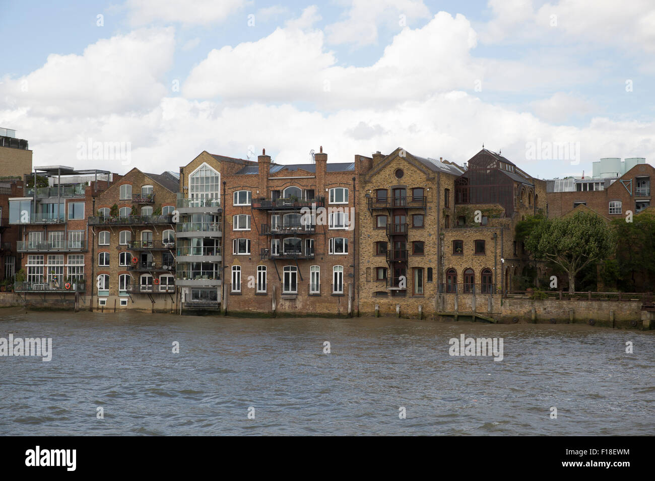Riverside apartments and office buildings as seen from the River Thames ...