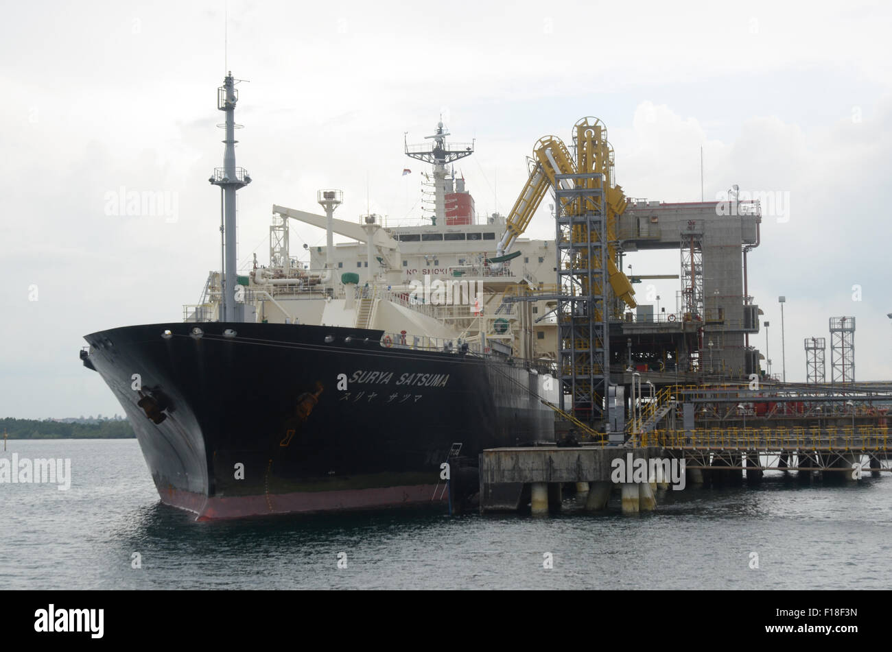 Tanker LNG loading gas from terminal in the seaport at LNG base Station ...