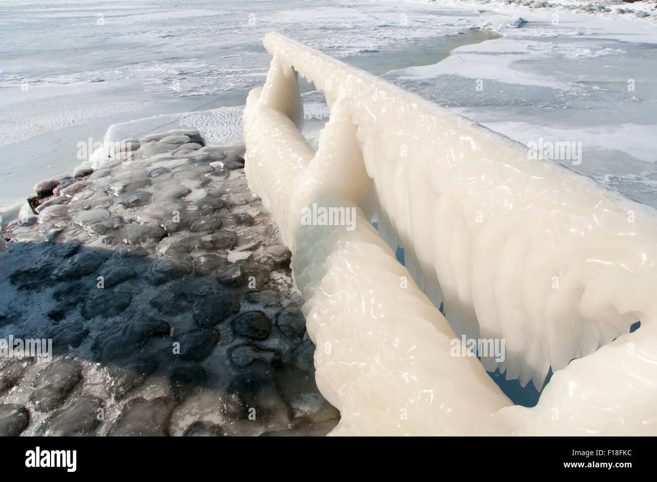 icecicles on guardrail, The Netherlands Stock Photo - Alamy