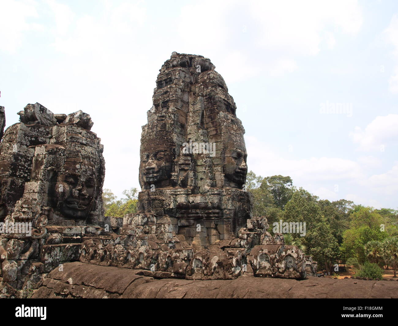 Faces at Ankhor Watt Stock Photo - Alamy