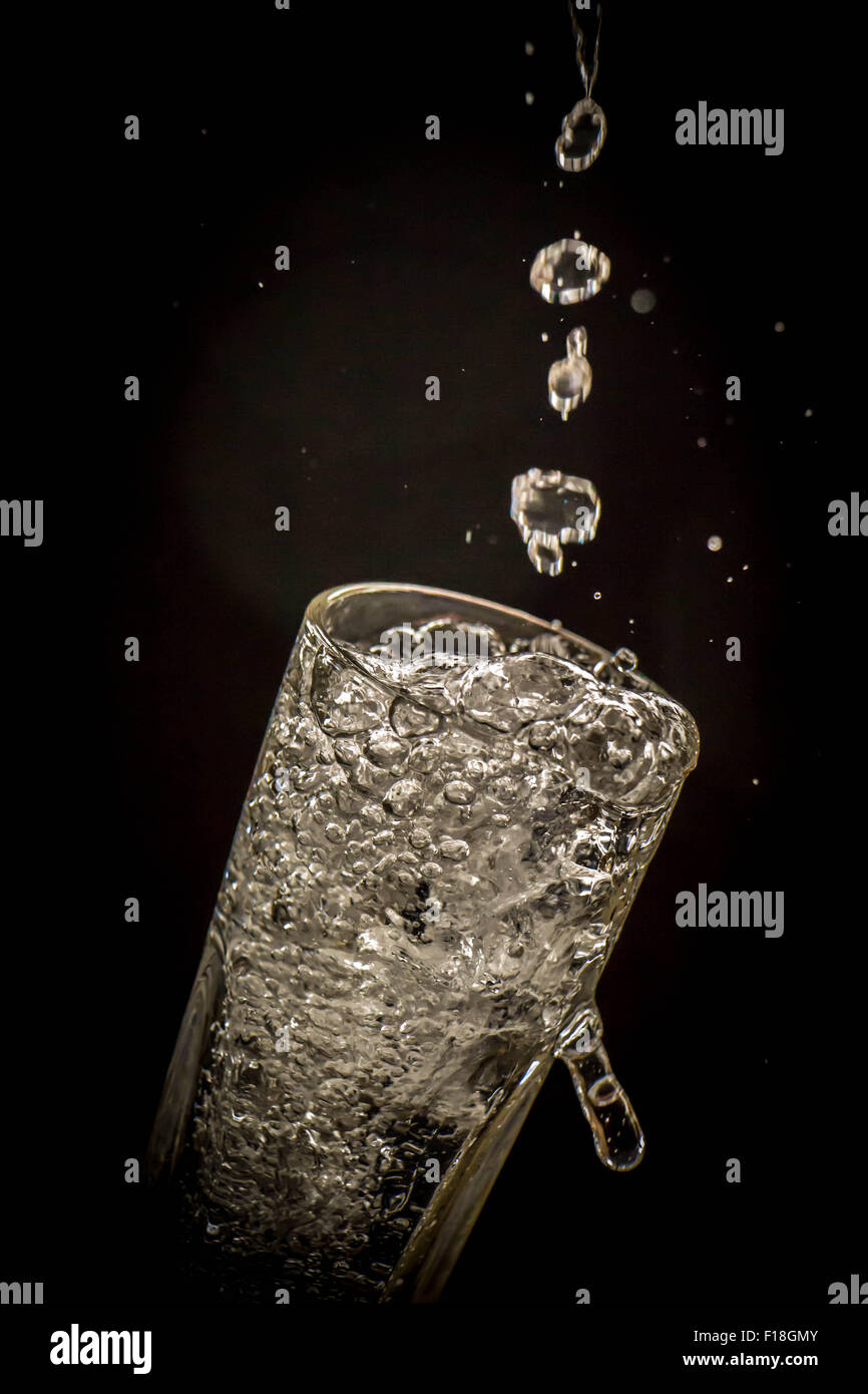 Overflow glass water hi-res stock photography and images - Alamy