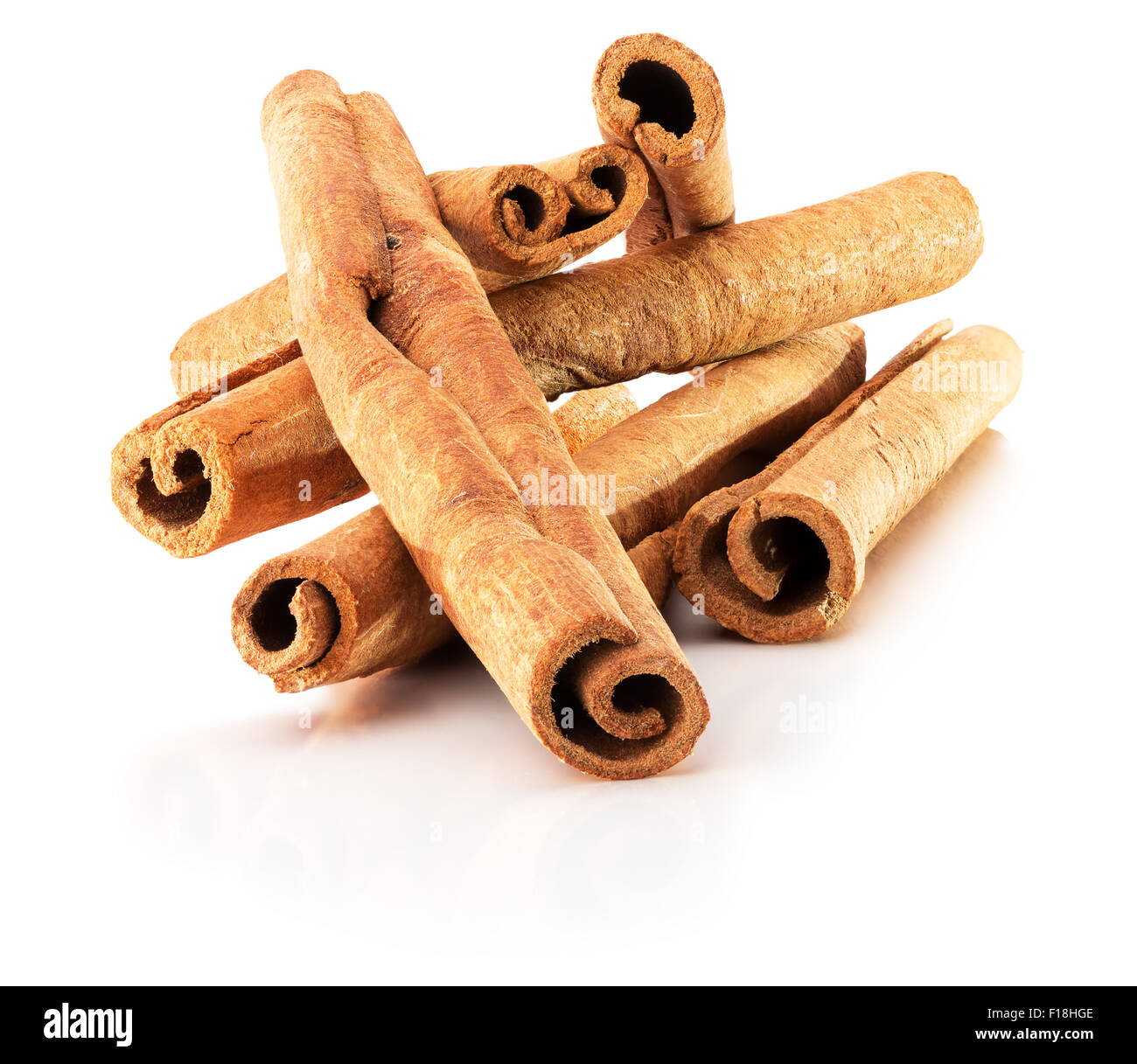 cinnamon sticks isolated on white background Stock Photo - Alamy