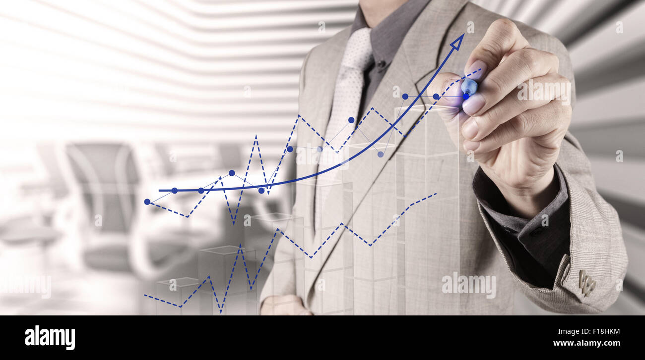 businessman hand draws business success chart concept on virtual screen ...