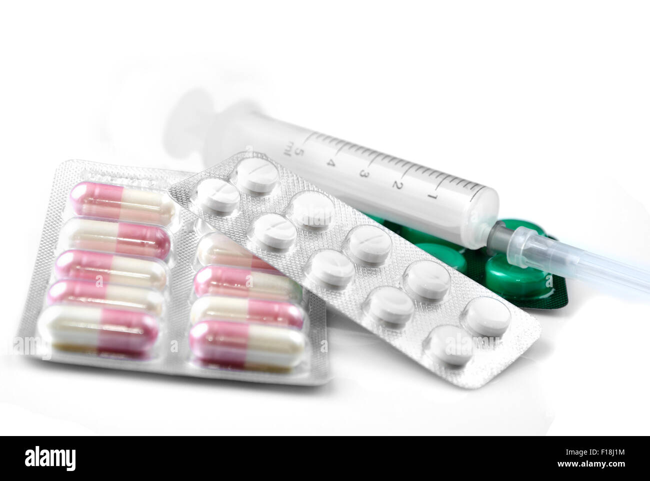 Medications on the table for treating patients on the white background ...