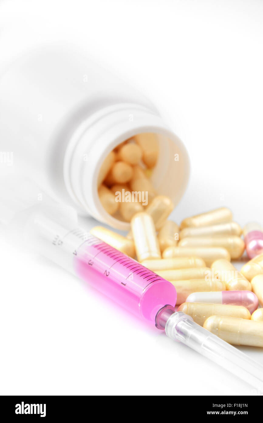 Medications on the table for treating patients on the white background ...