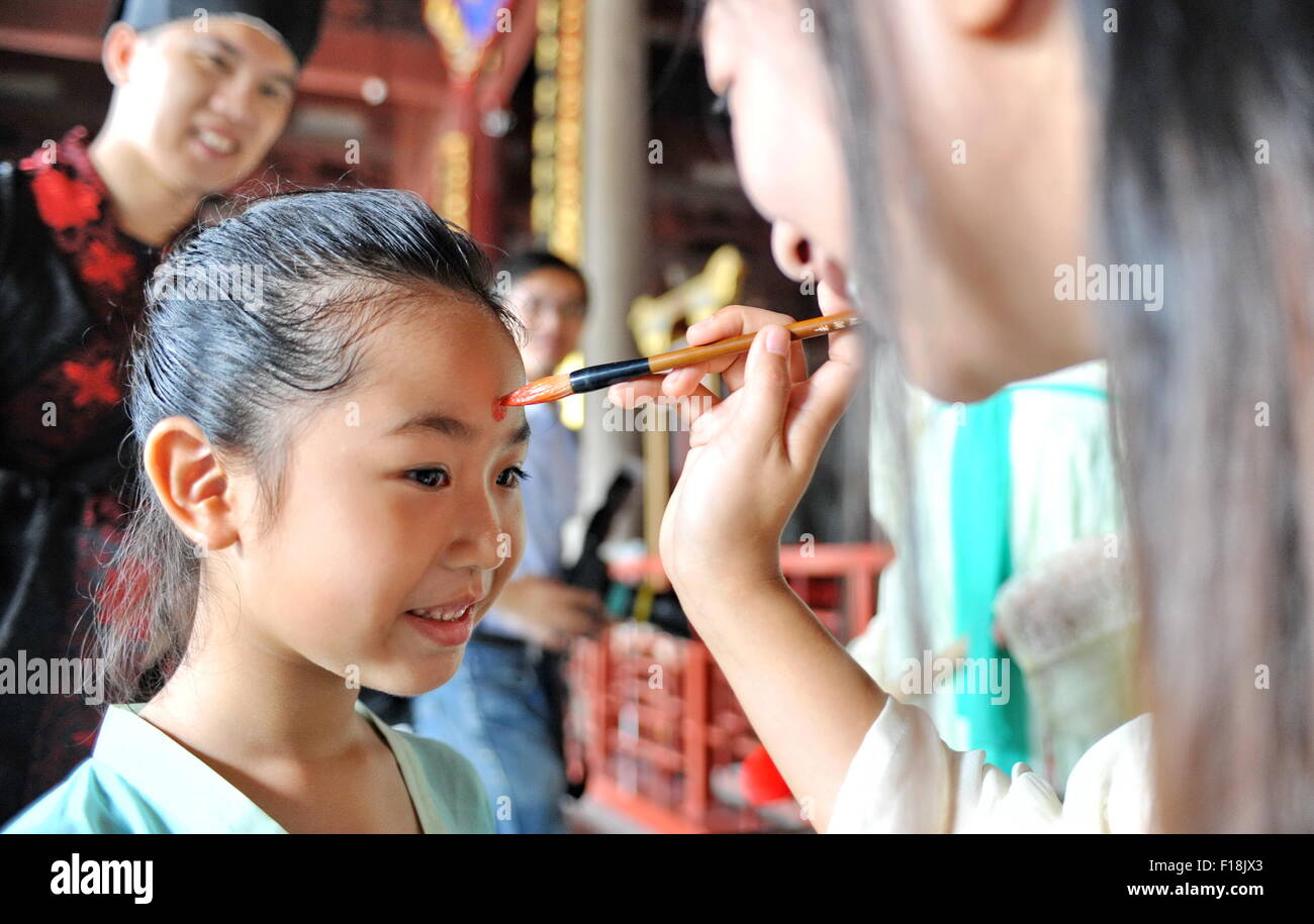 Fuzhou, China's Fujian Province. 30th Aug, 2015. A new first-grader ...