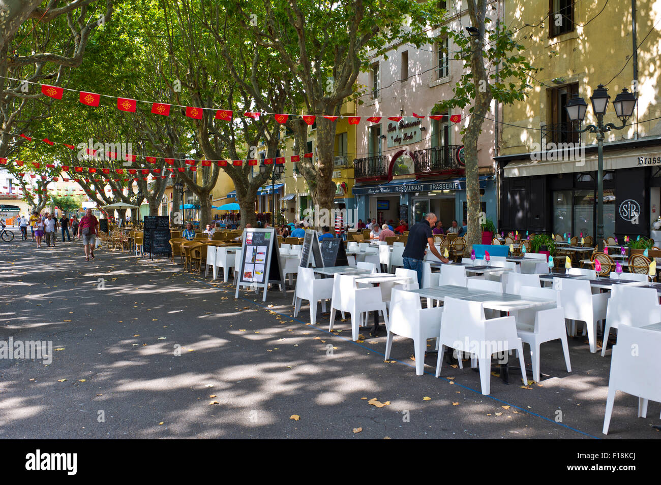 Town square and restaurants, Serignan, Herault Languedoc Roussillon ...