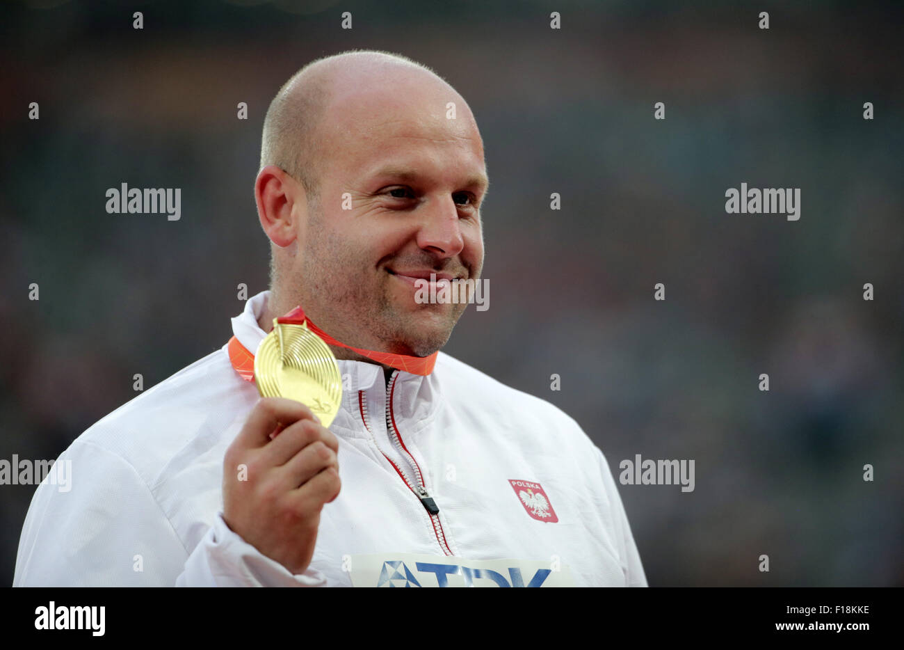 Beijing, China. 30th Aug, 2015. Piotr Malachowski of Poland poses with ...