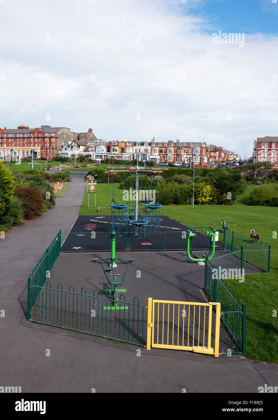 View across a childrens play area in a park in Blackpool, Lancashire ...