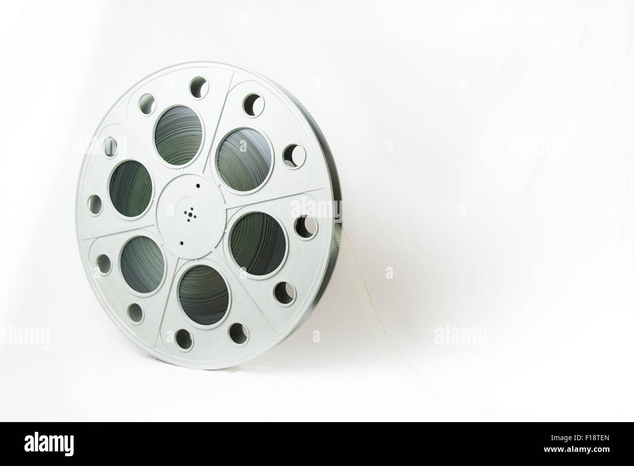 Big movie reel and 35 mm filmstrip Stock Photo - Alamy